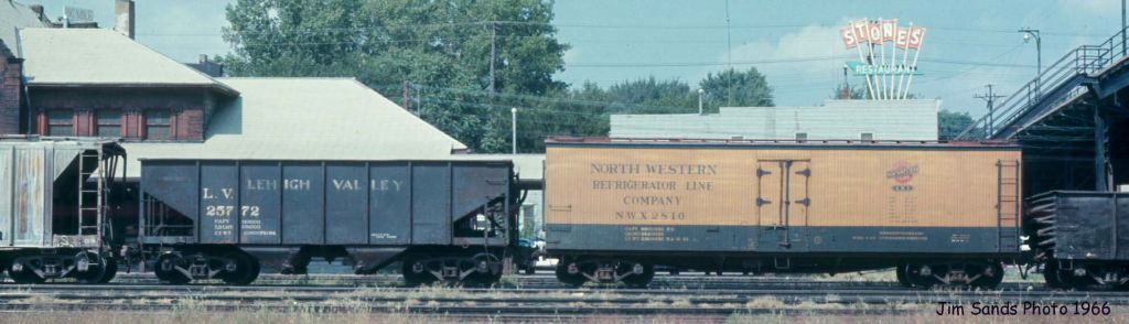NWX 2810 CNW reefer and Lehigh Valley Open Hopper 1966